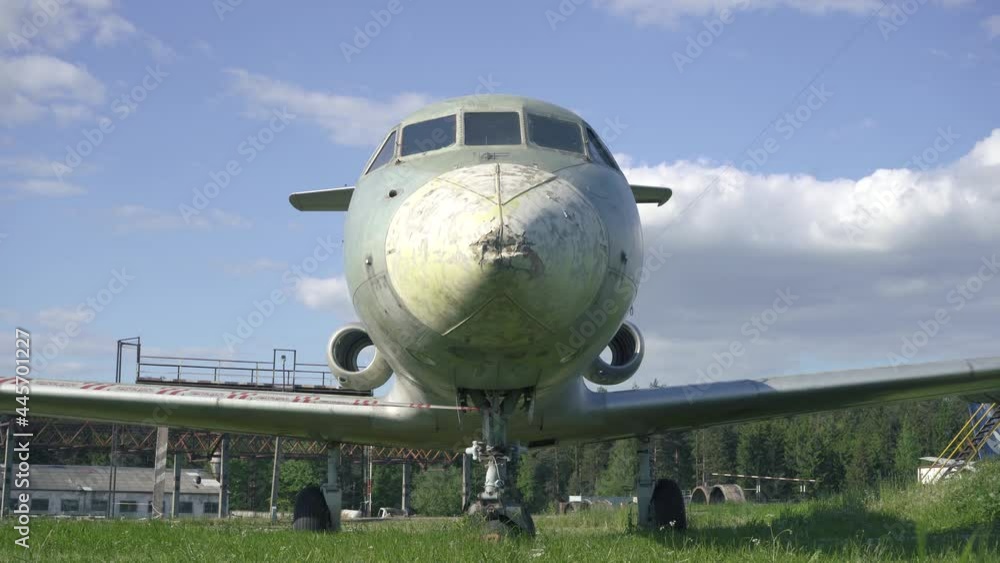 Close-up of cockpit fuselage of old USSR airplane standing in thick ...