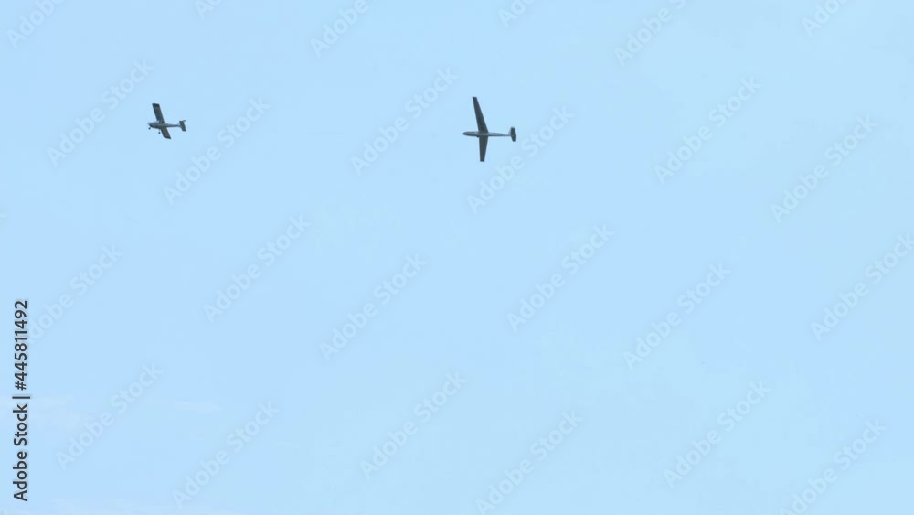 Glider planes flying in the sky. Extreme active sport. Clear blue sky ...