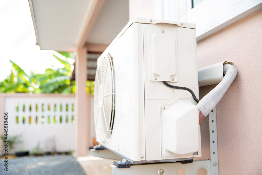 Air compressor, Close-up external split wall type of outdoor home air ...