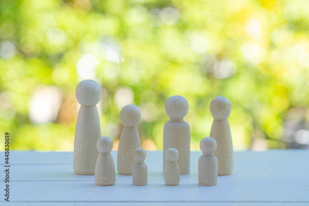 Poster wooden figures represent extended family including grandparents ...
