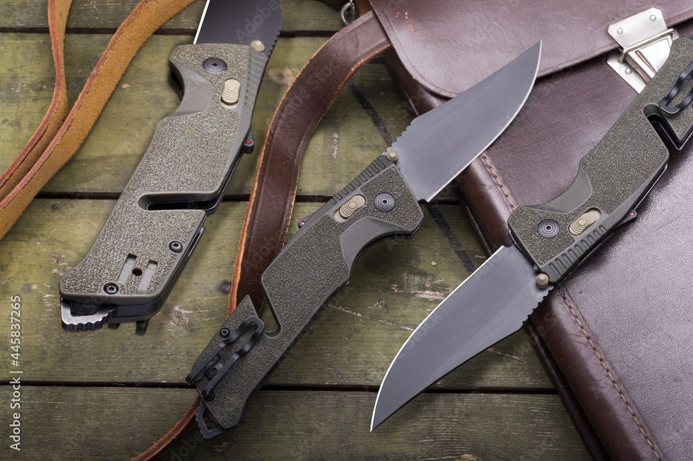 The knife is shown in three angles. Folding military knife. Knife and ...