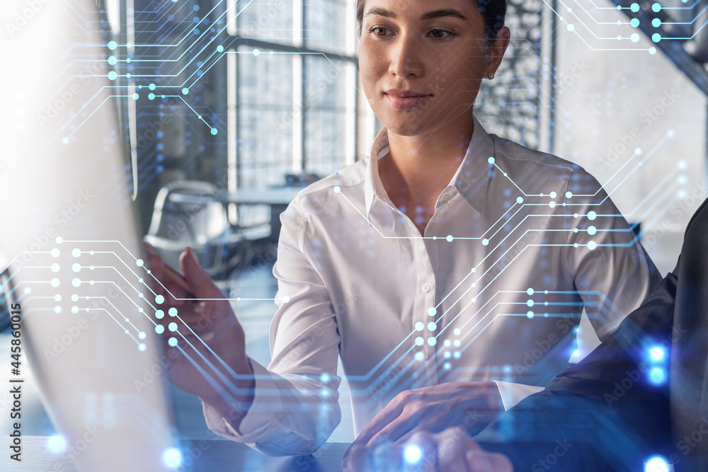 Two colleagues in formal wear working together to optimize business ...