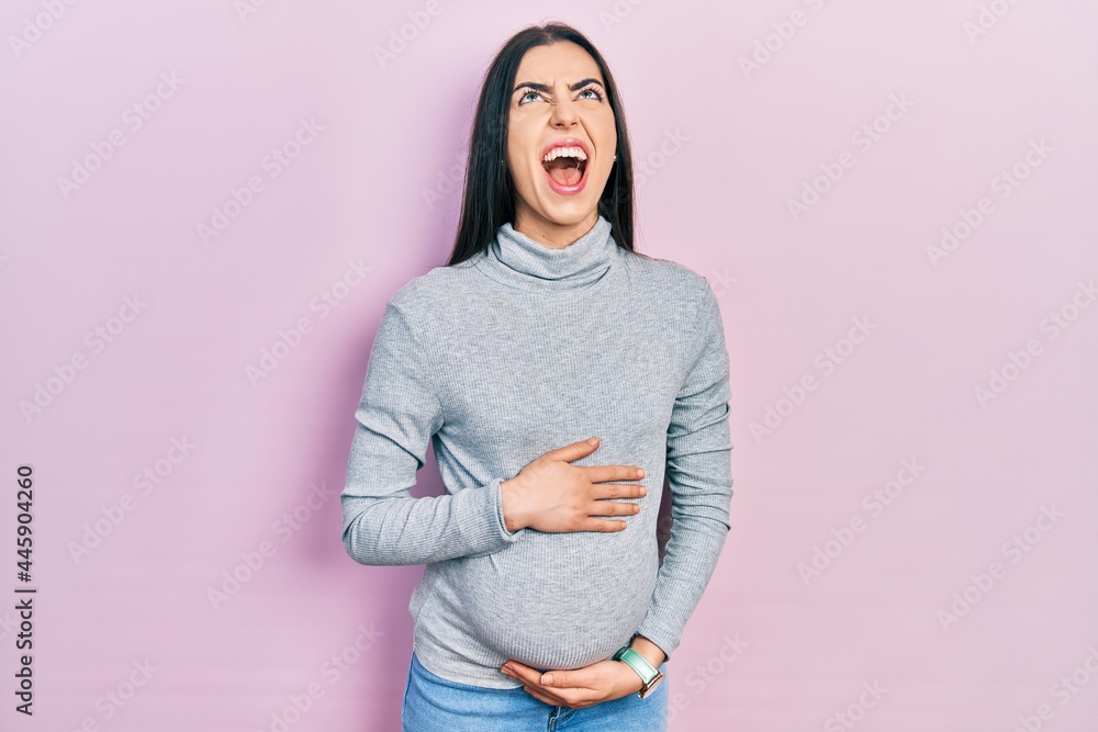 Beautiful woman with blue eyes expecting a baby, touching pregnant ...