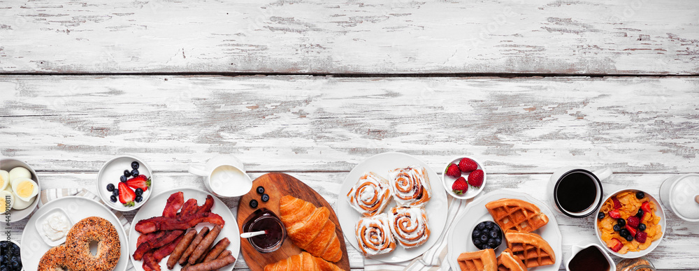 Breakfast or brunch bottom border. Top view on a white wood banner ...