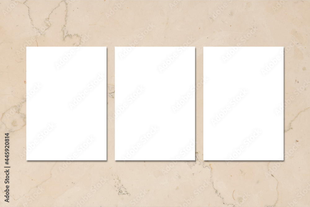 Three empty white vertical DIN A4 rectangle poster or business card ...
