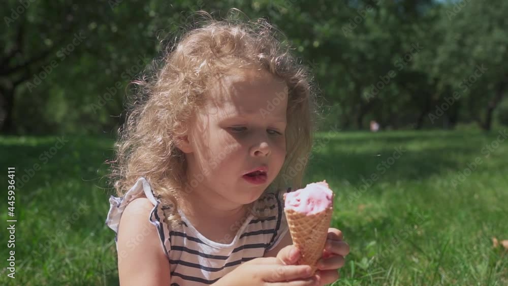 Cute Blonde Curly Girl Eating Ice Cream In The Park On A Sunny Summer 9456