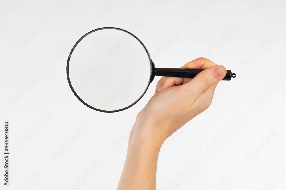 Magnifying glass and woman hand. Human hand with magnifying glass ...
