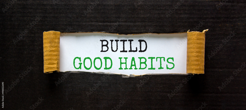 Build good habits symbol. Words 'Build good habits' appearing behind ...