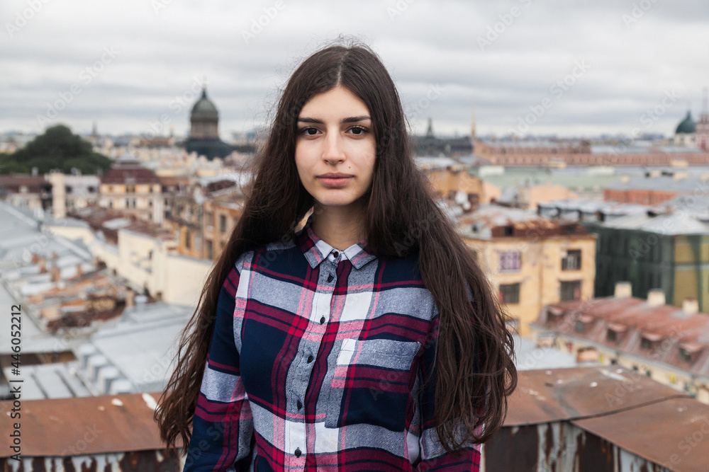 portrait of an Armenian girl with fluttering long black hair in a ...