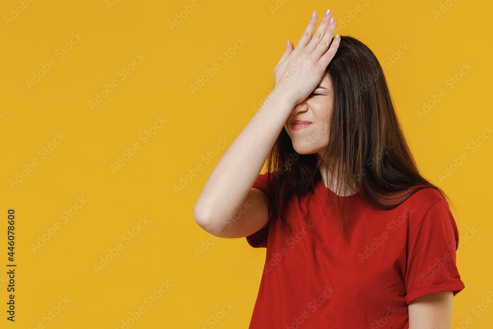 Beautiful young brunette woman 20s wear basic red t-shirt putting hand ...