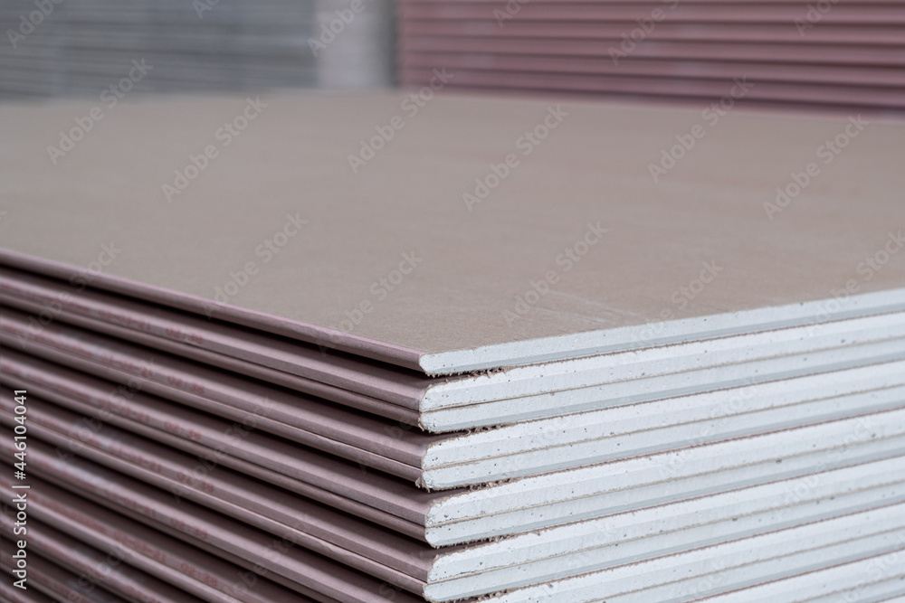 The stack of Plasterboard fire resistant gypsum board cardboard surface ...