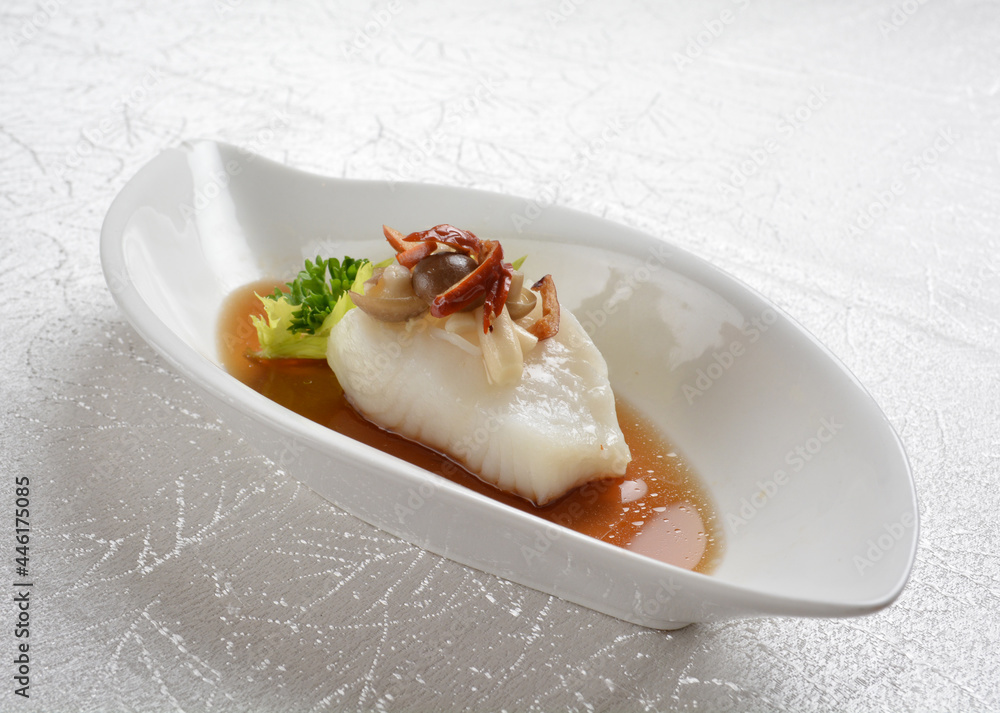 steamed fresh cod grouper fish fillet with vegetable, herb and black ...