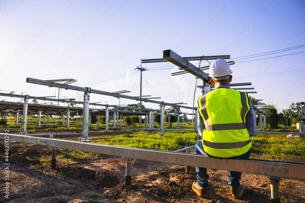engineer inspect solar tracking machine in solar power plant; Monitor ...