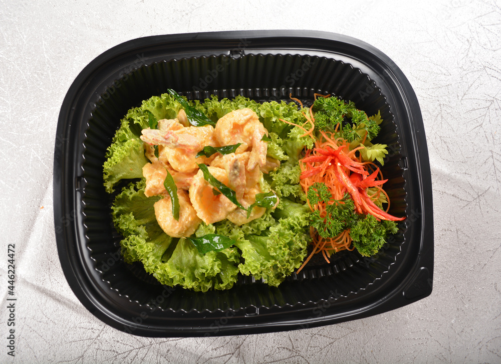 stir fried big tiger prawn with salted egg yolk creamy sauce and curry ...