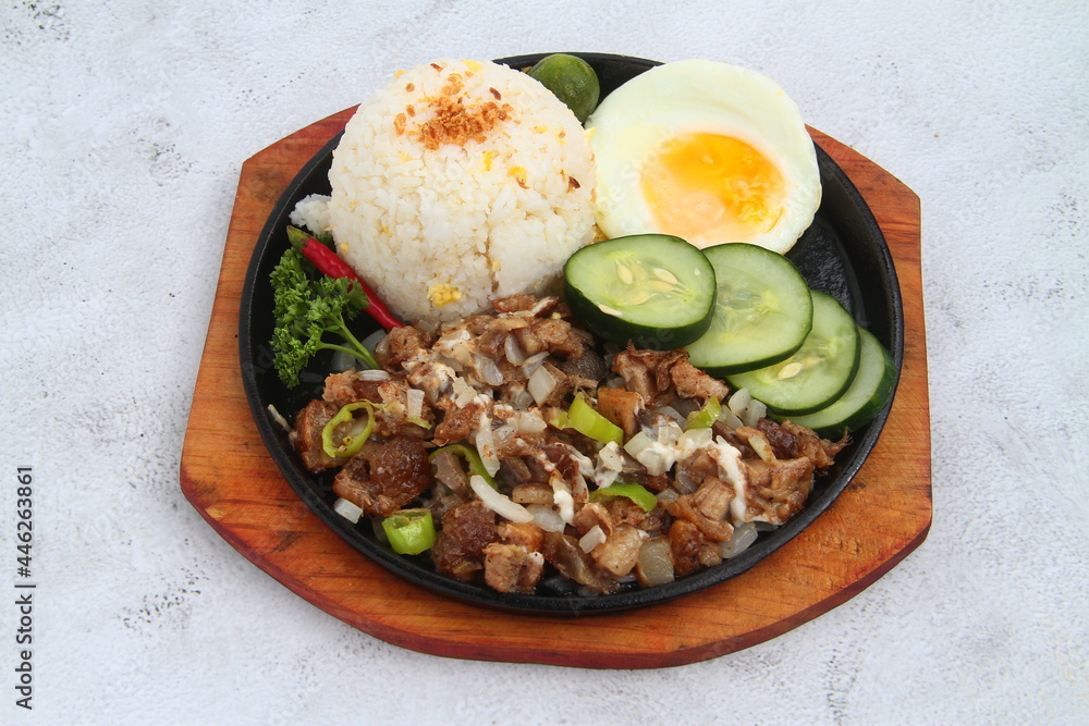 Freshly cooked Filipino food called pork sisig Stock Photo | Adobe Stock