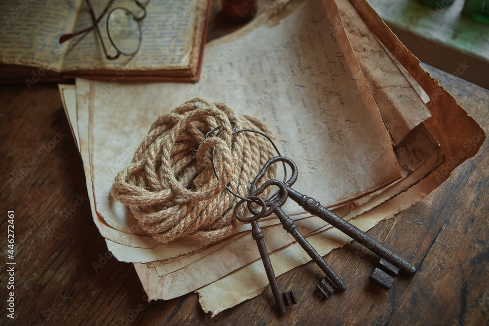Rope, keys and a manuscript. Preparation of equipment for the ...