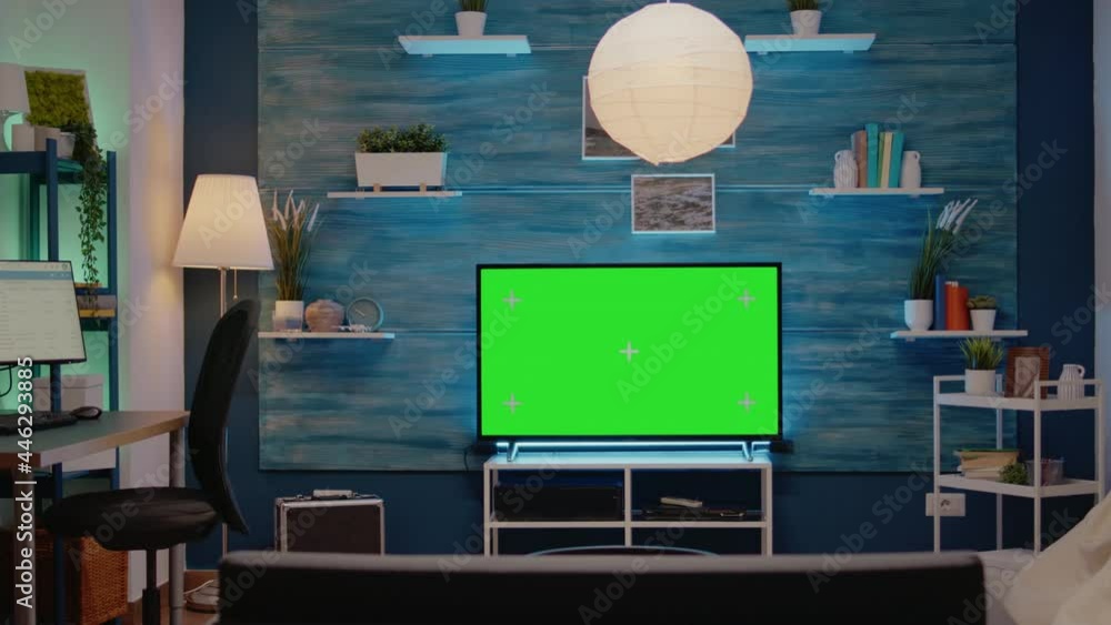 Green screen design on television in empty room at modern flat. Chroma ...