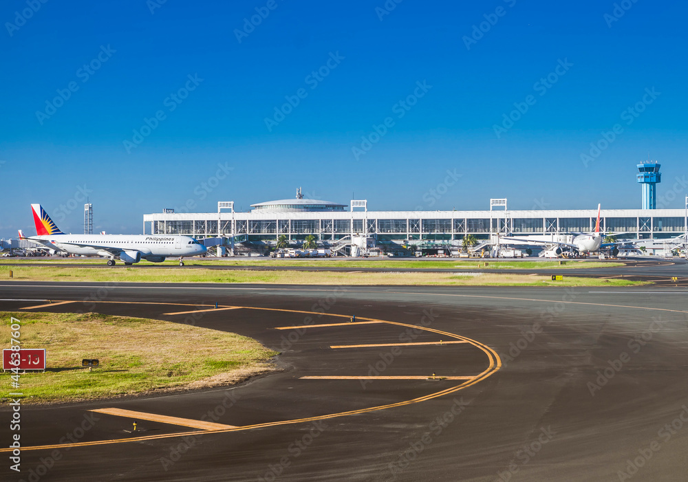 NAIA Terminal 2 airport in Manila, Philippines. View of runway, tarmac ...