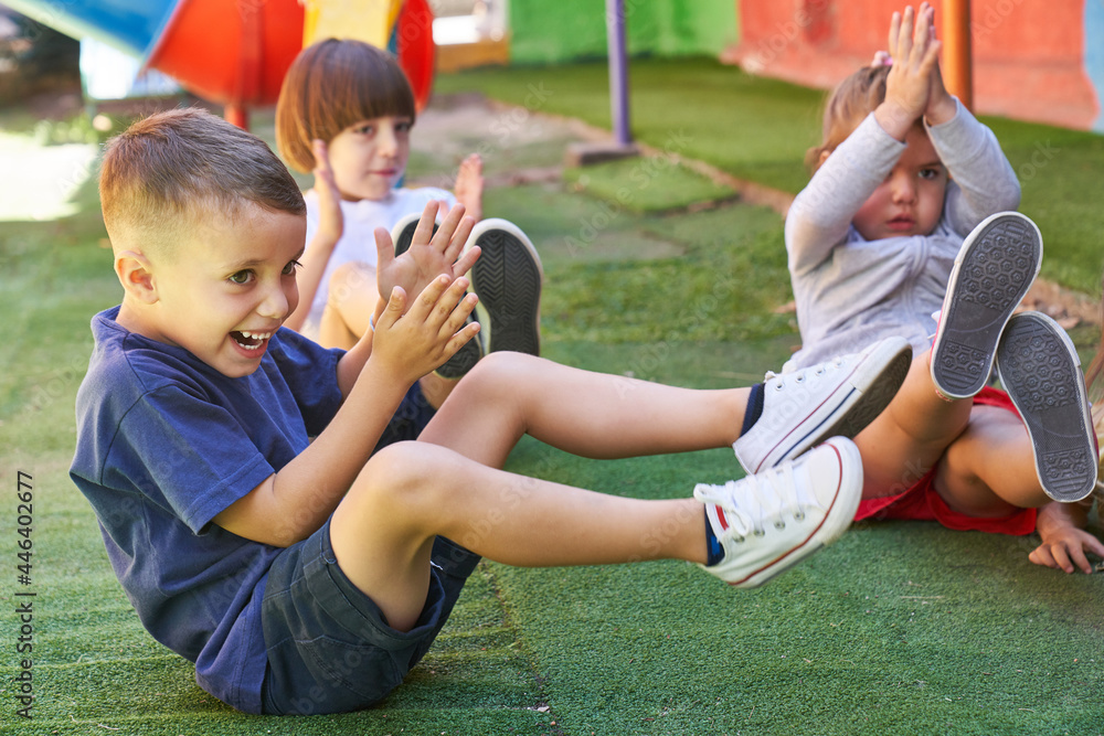 Children Have Fun Doing Children s Gymnastics Or Aerobics Stock Photo children-have-fun-doing-children-s-gymnastics-or-aerobics-stock-photo