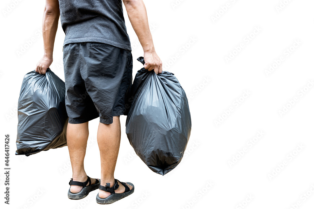 Back view,Man holding a black trash bag containing garbage in his hands ...