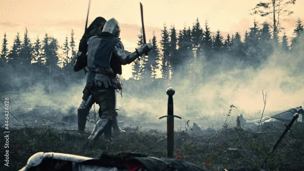 Dark Age Battlefield: Two Armored Medieval Knights Fighting with Swords ...