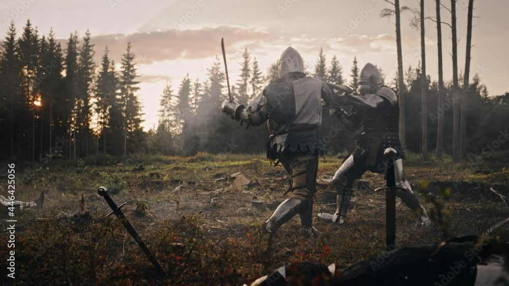 Dark Age Battlefield: Two Armored Medieval Knights Fighting with Swords ...