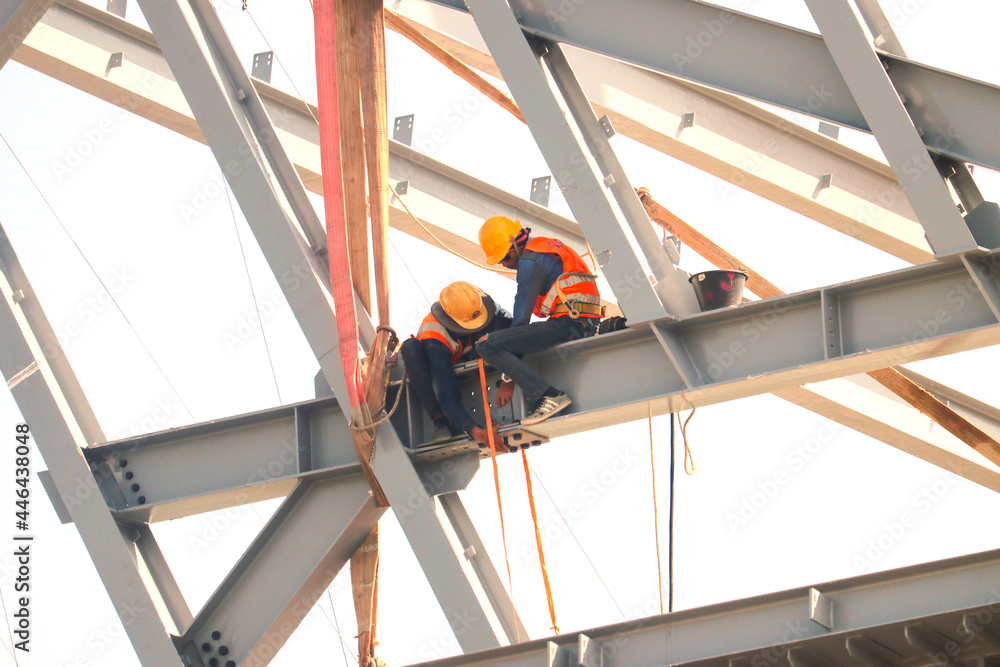 Working at Heights Safely, Workers building a train station at Thailand ...