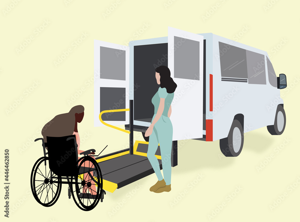 Volunteer helping young disabled woman in wheelchair, working on laptop ...