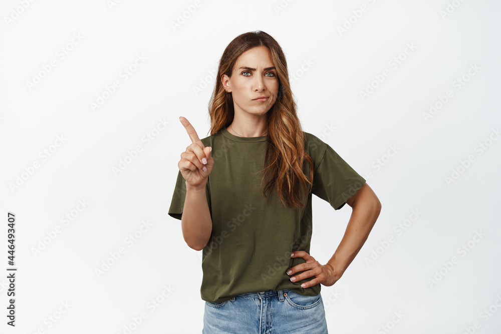 Very bad. Adult woman, mother shaking finger and smirk upset ...