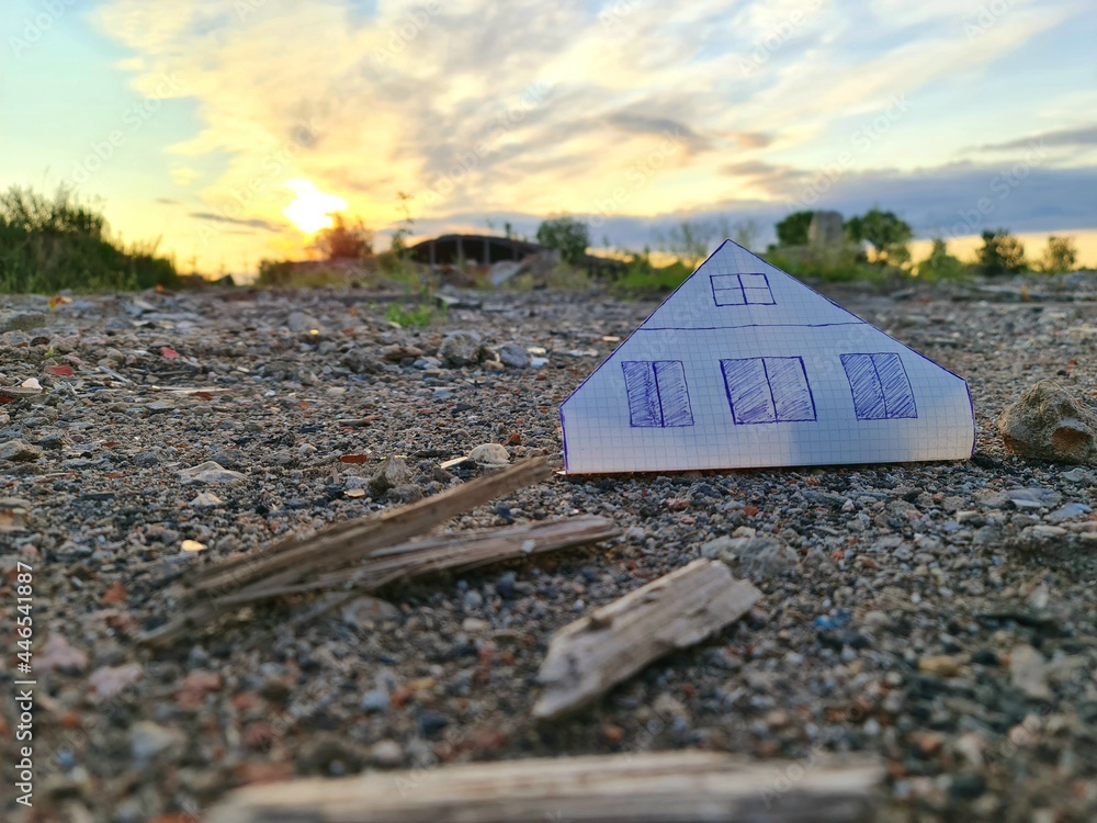 House made of paper. House in ruins. Drawn house from a sheet ...