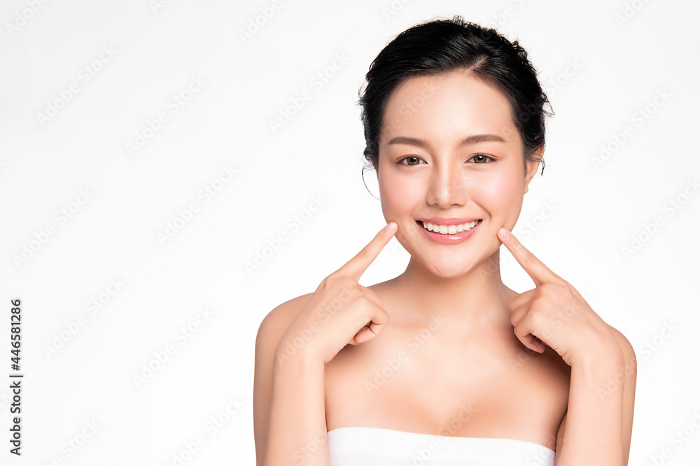 Beautiful young asian woman with clean fresh skin on white background ...