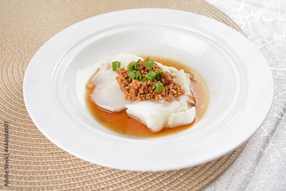 steamed cod fish fillet seafood with herb and spicy bean crumb in dark ...