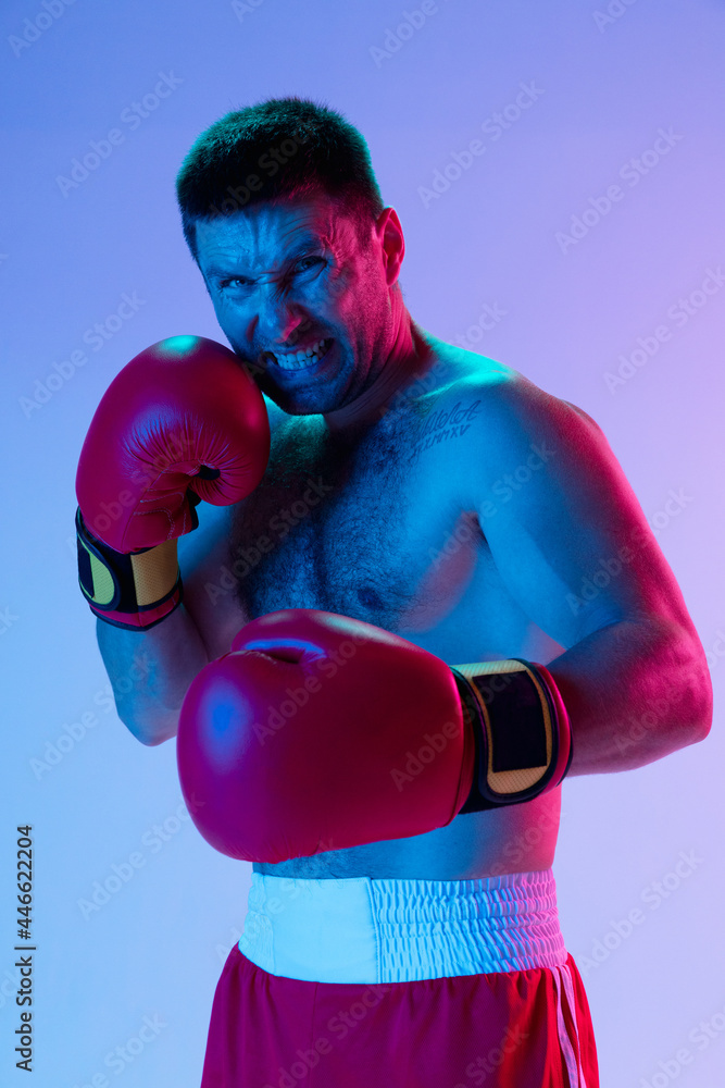 Portrait of Caucasian man, professional boxer in sportwear isolated on ...