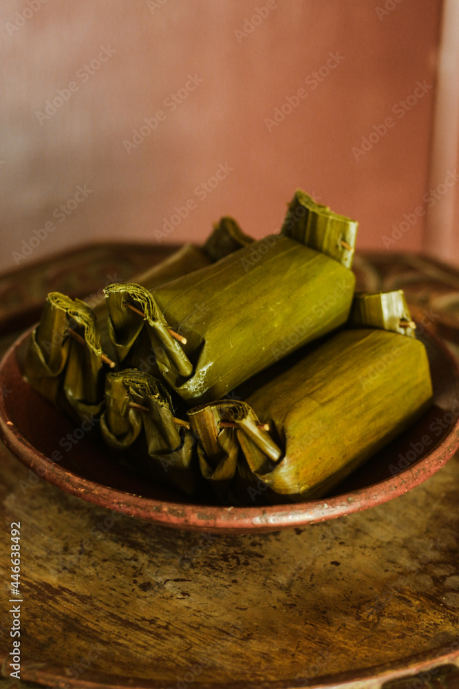 arem-arem is traditional food from java. is rice cake filled with spicy ...