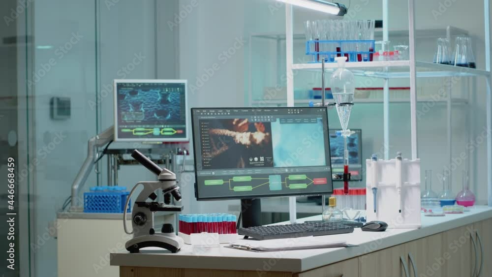 Biochemistry desk with scientific computer in laboratory for blood and ...