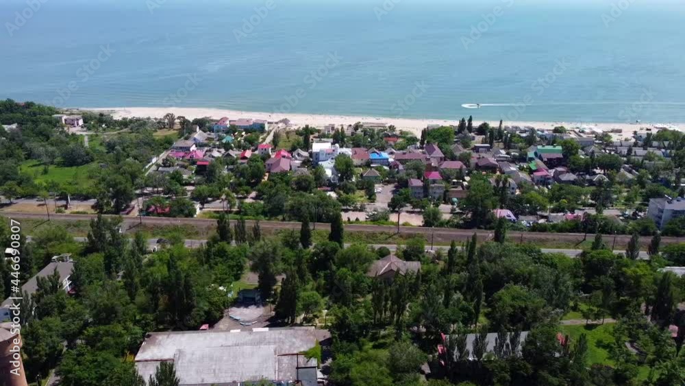 Sea and sand beach in Zatoka. Hotels and houses. Vacationers on the ...