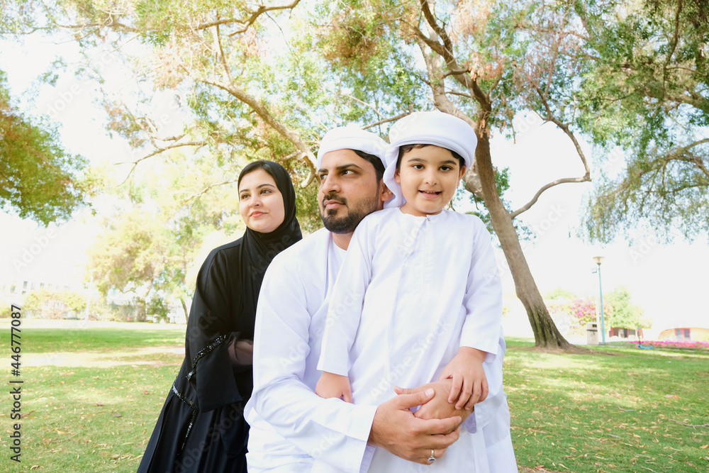 Cute Arab boy with Family. Arabic father with wife and son in the ...