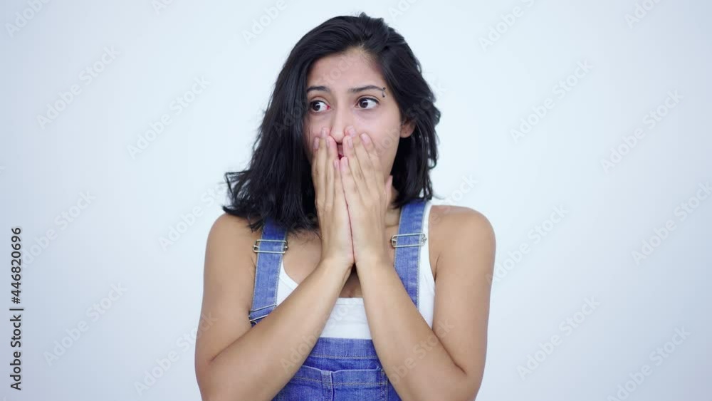 Close up portrait of shocked amazed mexican woman touching face in ...