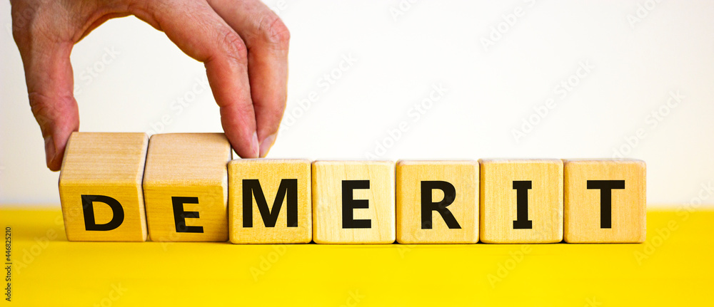 Demerit or merit symbol. Businessman turns wooden cubes and changes ...