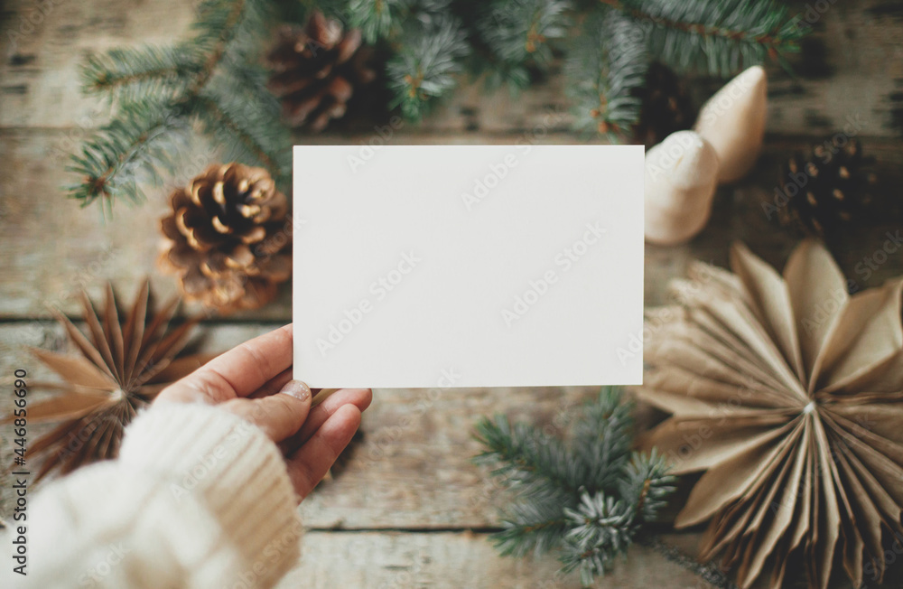 Christmas card mock up. Hand holding empty greeting card on background ... Christmas card mock up. Hand holding empty greeting card on background ...