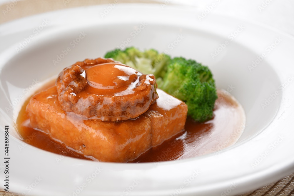 braised whole big abalone with bean curd tofu and broccoli in chef ...