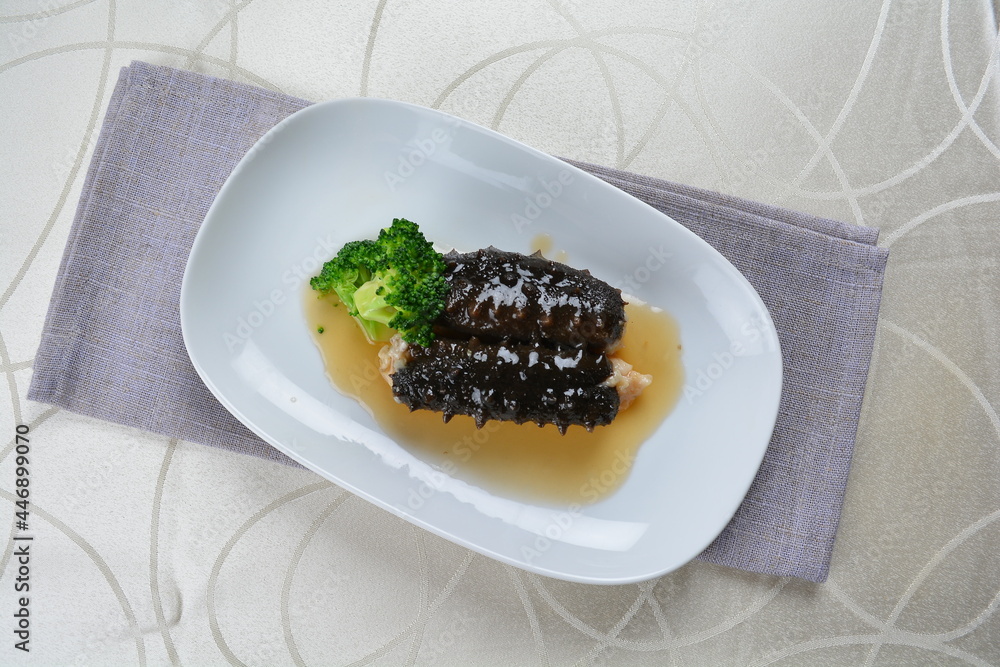 braised cook whole sea cucumber with vegetable in special chef oyster ...