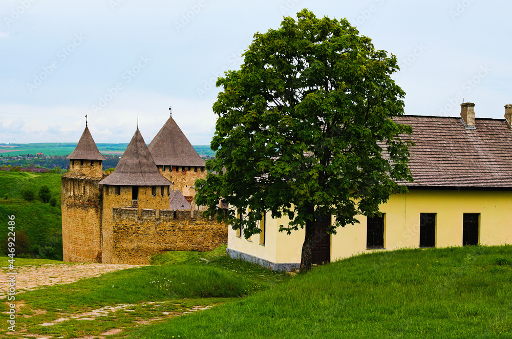 Scenic landscape of old cobblestone way to the ancient fortress ...