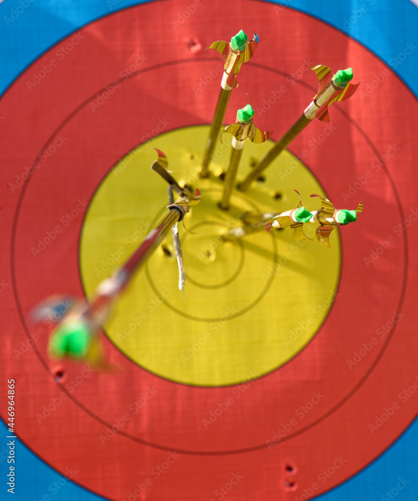 Archery - Targetface with arrows. On arrow hit another one, cracked the ...