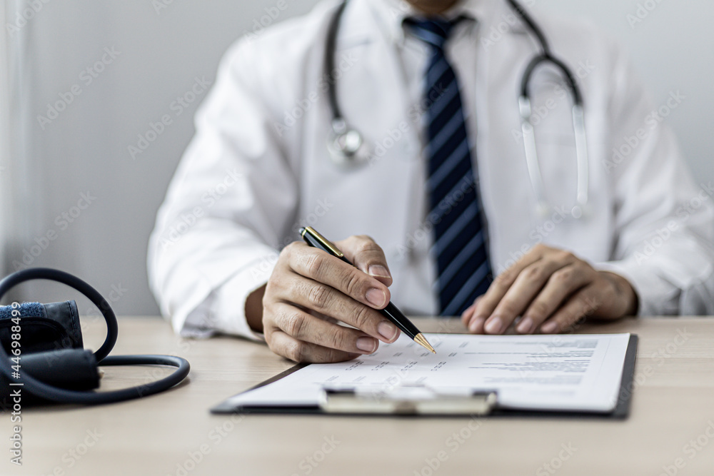 The doctor is explaining the details of the patient's physical ...