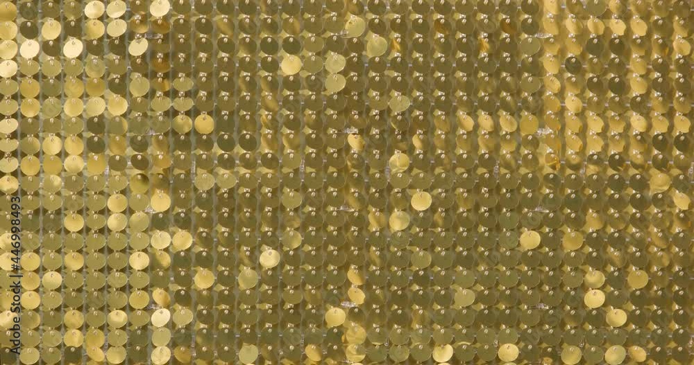 Video Stock rows of blinking golden yellow brass metal plaques sway in ...