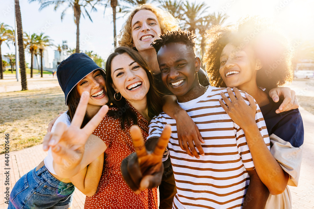 Portrait group of young multicultural trendy friends looking at camera ...