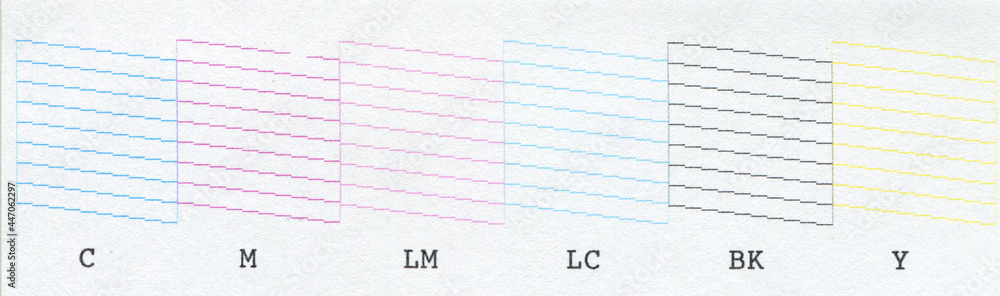 6-color photo printer nozzle test on a white sheet of paper Stock ...