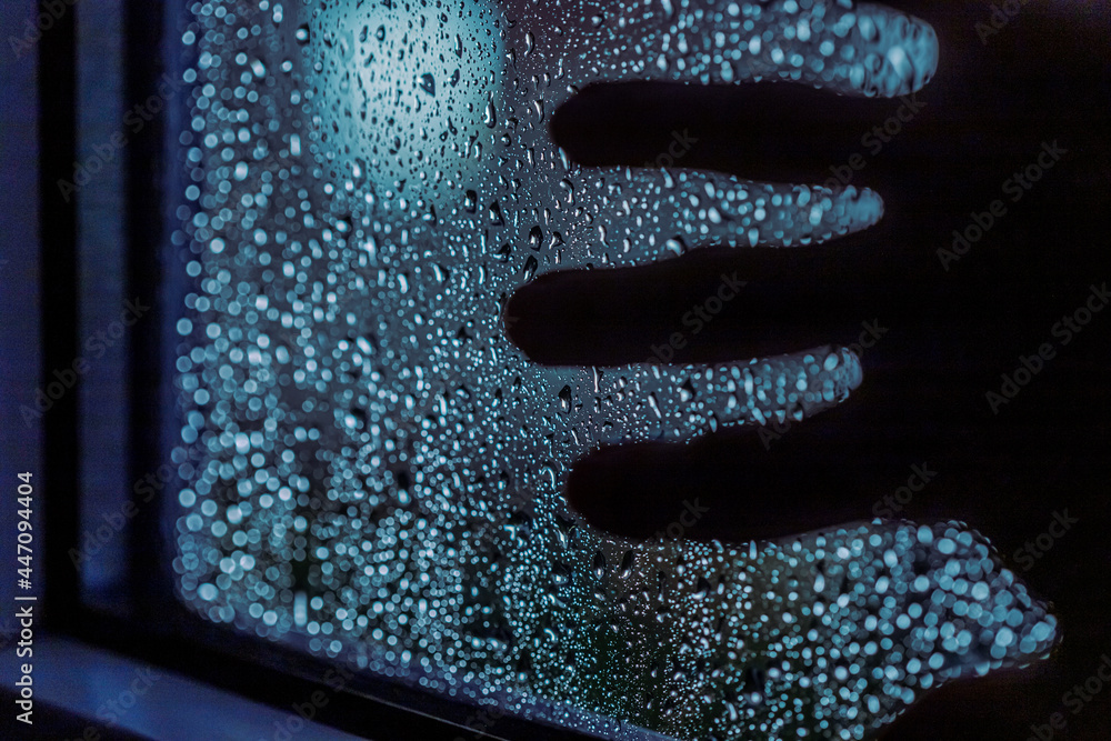 Depression and goodbye concept: dark silhouette of human hand on window ...