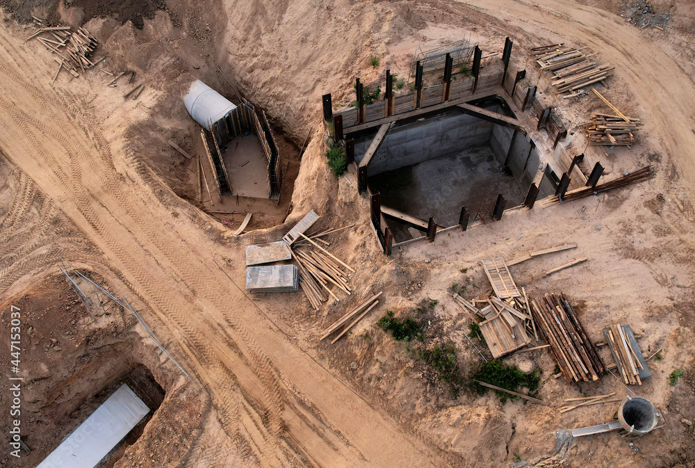 Construction of stormwater pits and sanitary sewer system. Laying of ...